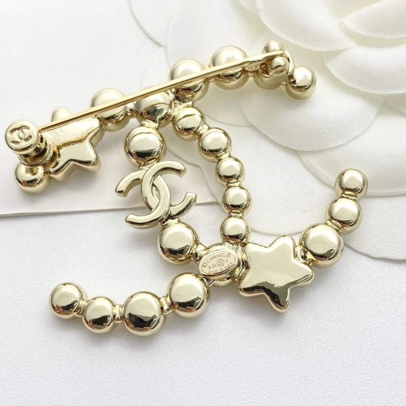 Indistinguishable Chanel Brooches
