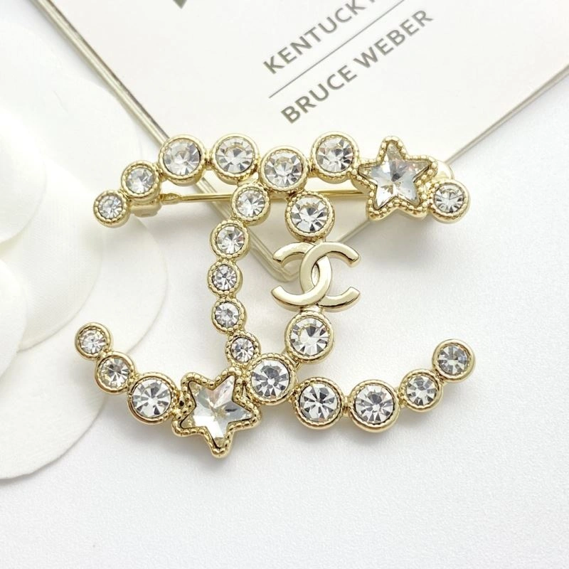 Indistinguishable Chanel Brooches