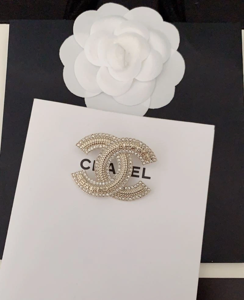 Indistinguishable Chanel Brooches
