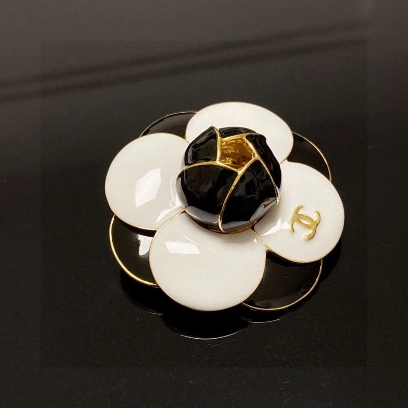 Cut-rate Chanel Brooches