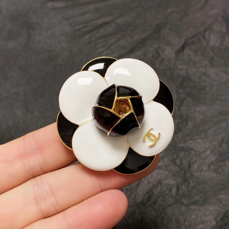 Cut-rate Chanel Brooches