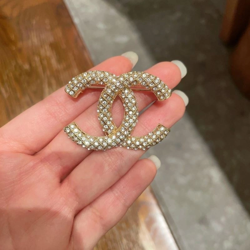 Indistinguishable Chanel Brooches