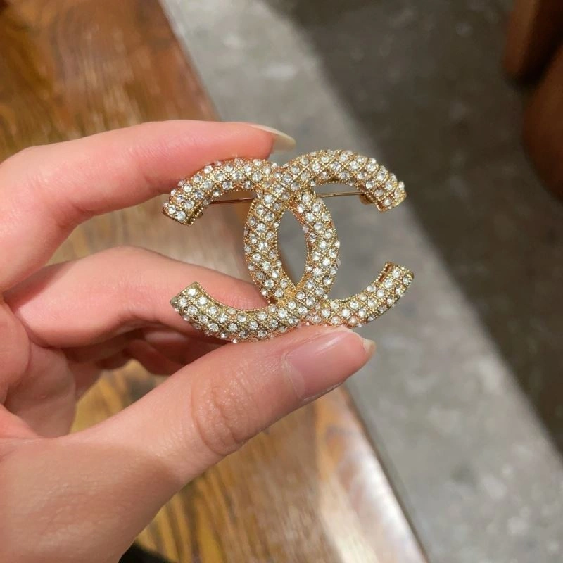 Indistinguishable Chanel Brooches