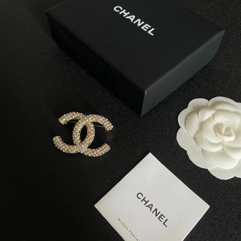 Indistinguishable Chanel Brooches