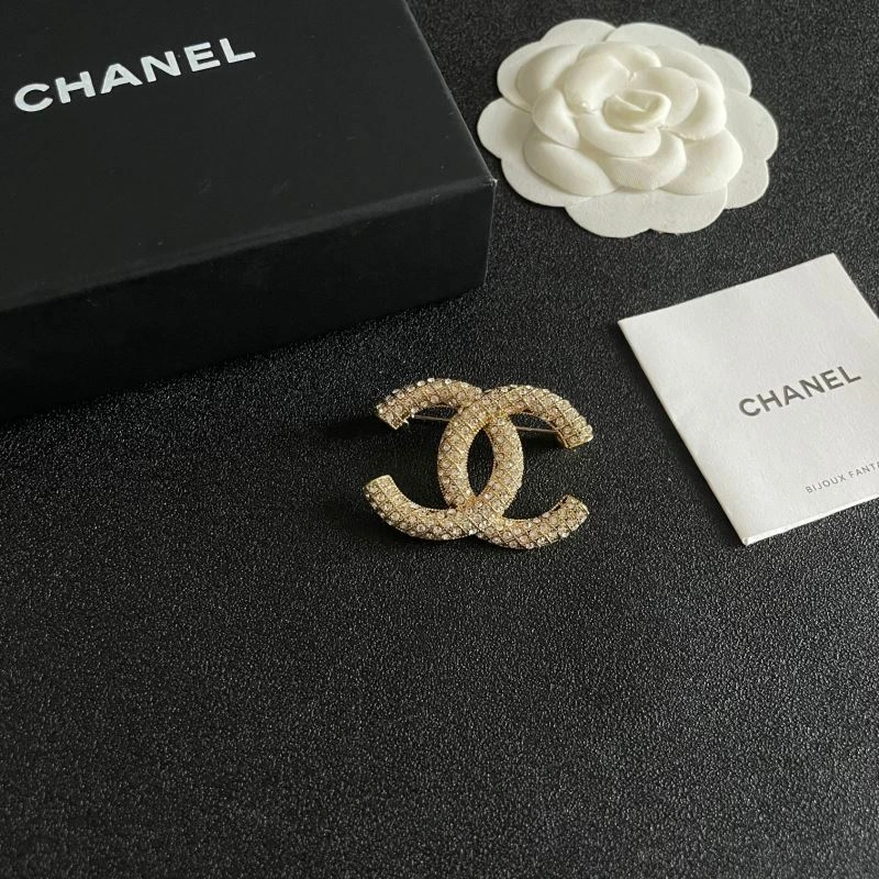 Indistinguishable Chanel Brooches