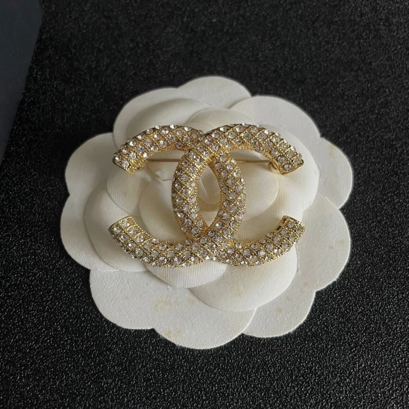 Indistinguishable Chanel Brooches