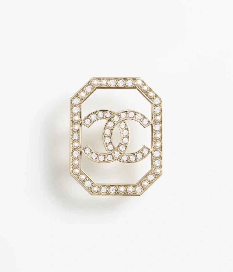 Top mirror Chanel Brooches