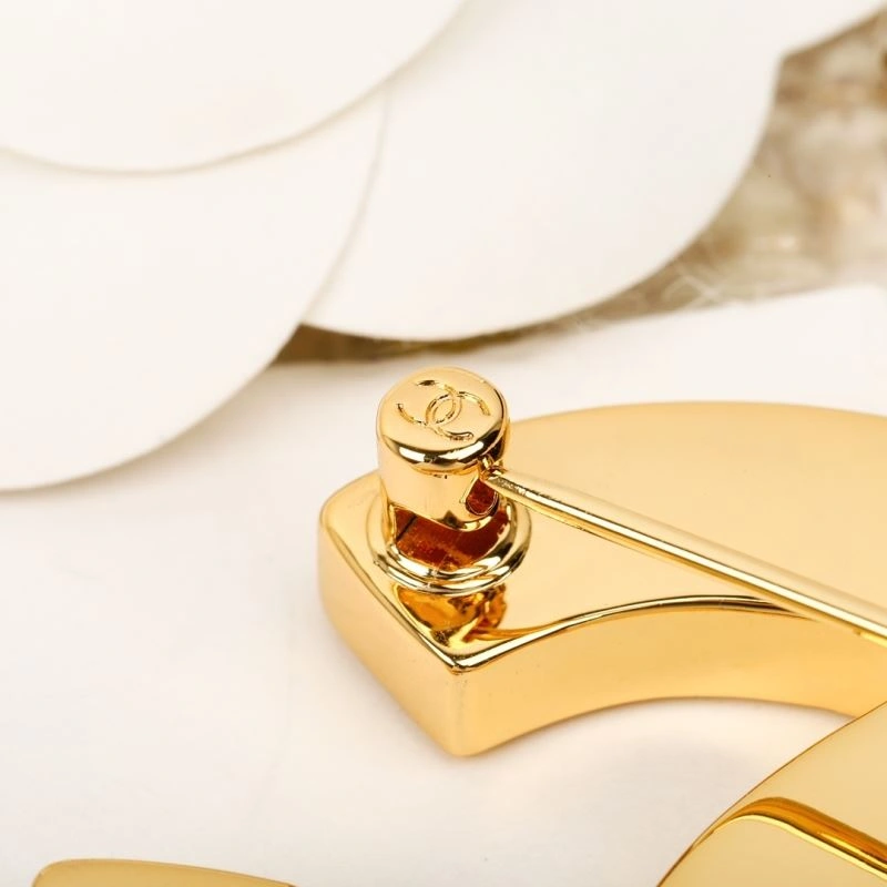 Cut-rate Chanel Brooches