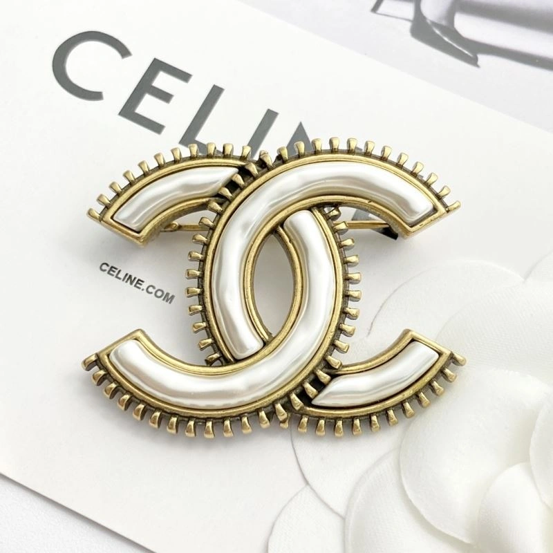 Indistinguishable Chanel Brooches