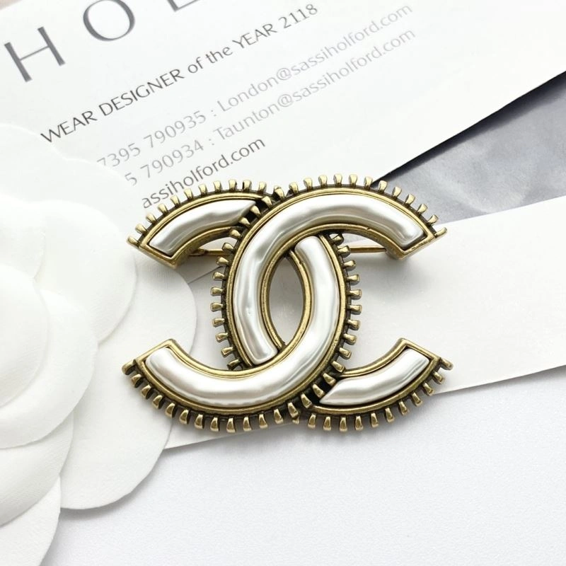 Indistinguishable Chanel Brooches