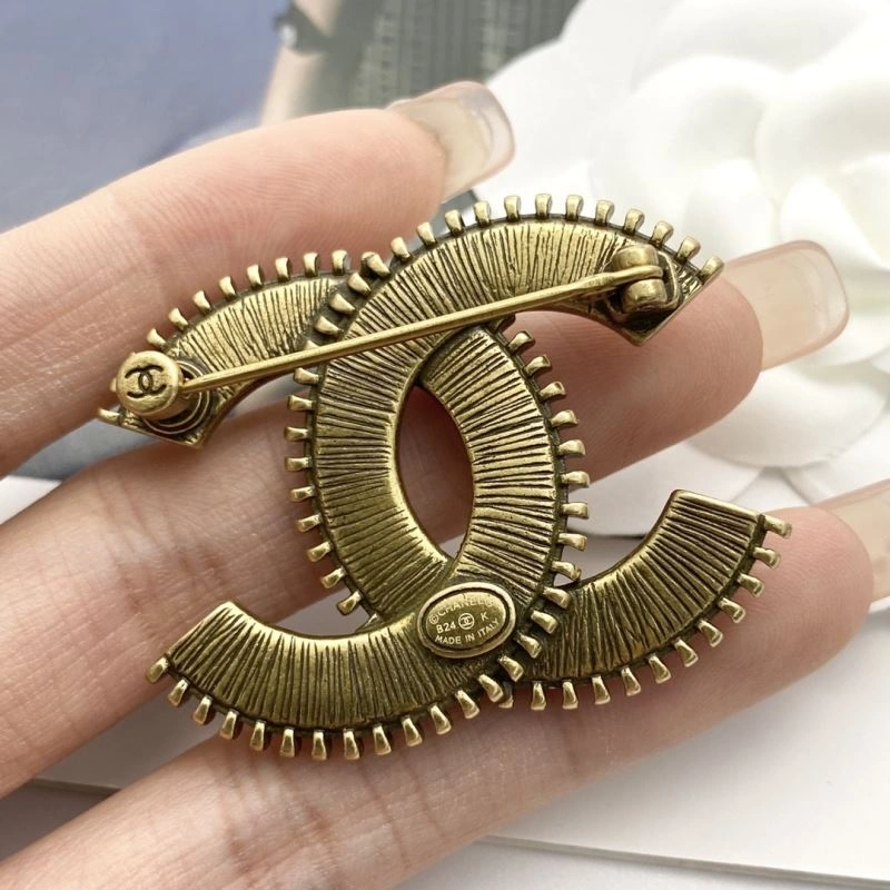 Indistinguishable Chanel Brooches