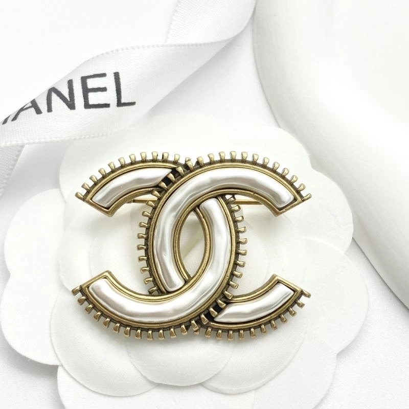 Indistinguishable Chanel Brooches