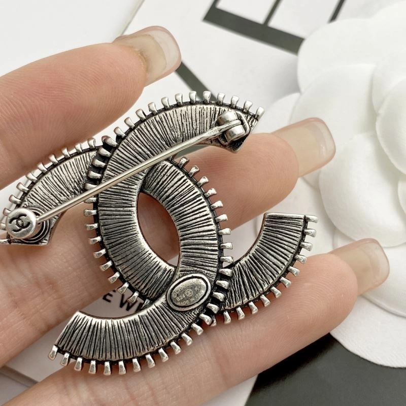 Cut-rate Chanel Brooches