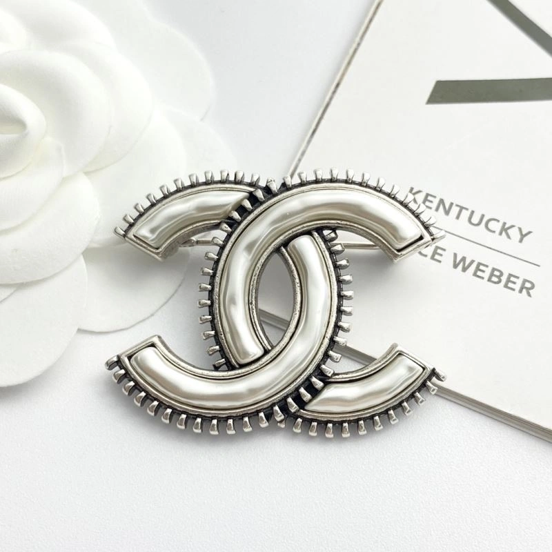 Cut-rate Chanel Brooches