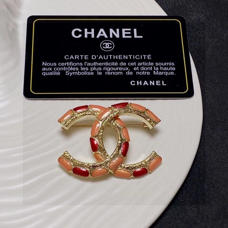 Indistinguishable Chanel Brooches
