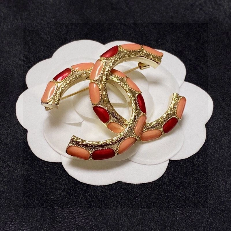 Indistinguishable Chanel Brooches