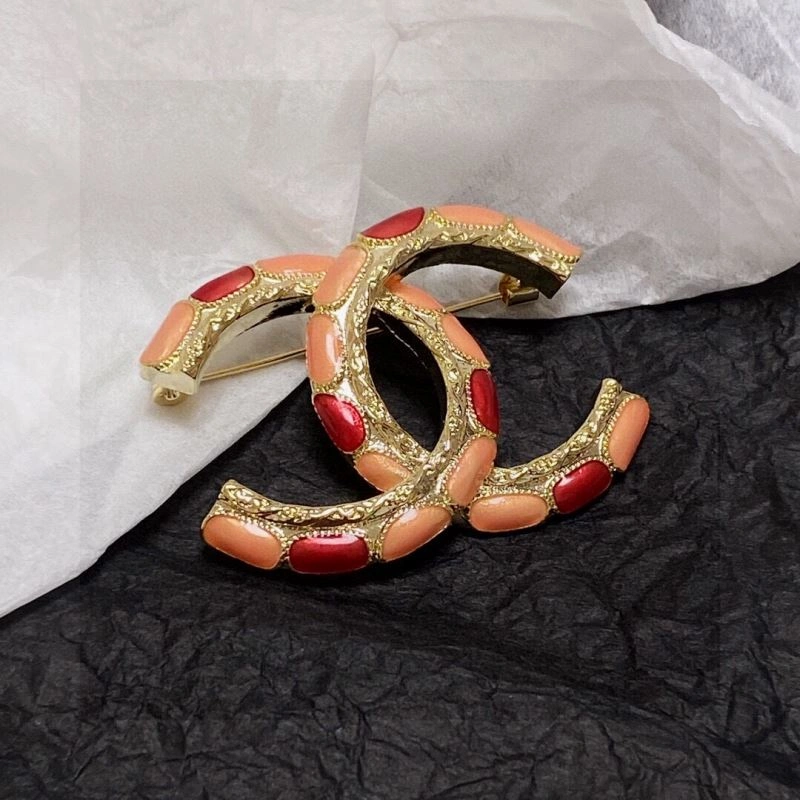 Indistinguishable Chanel Brooches