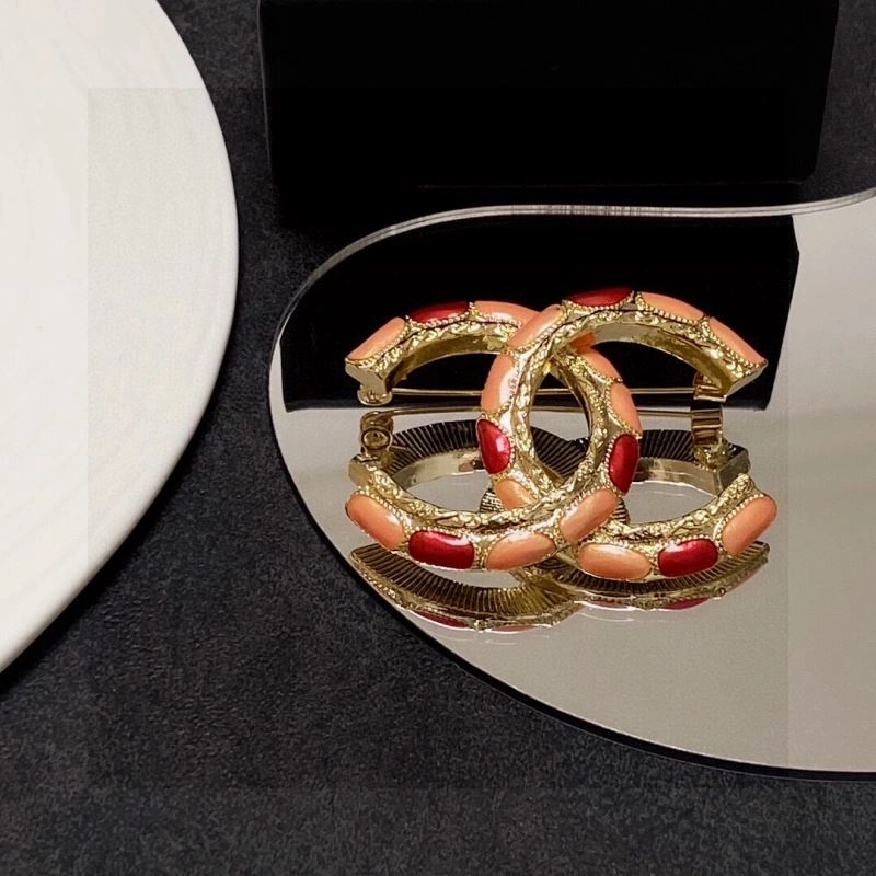 Indistinguishable Chanel Brooches