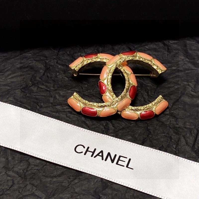 Indistinguishable Chanel Brooches