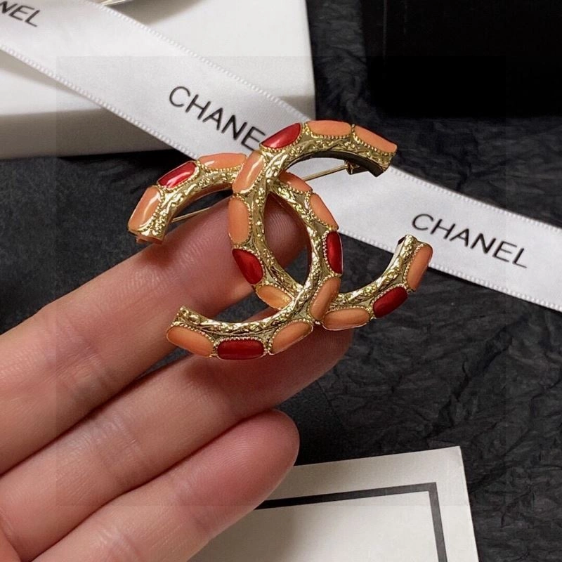 Indistinguishable Chanel Brooches