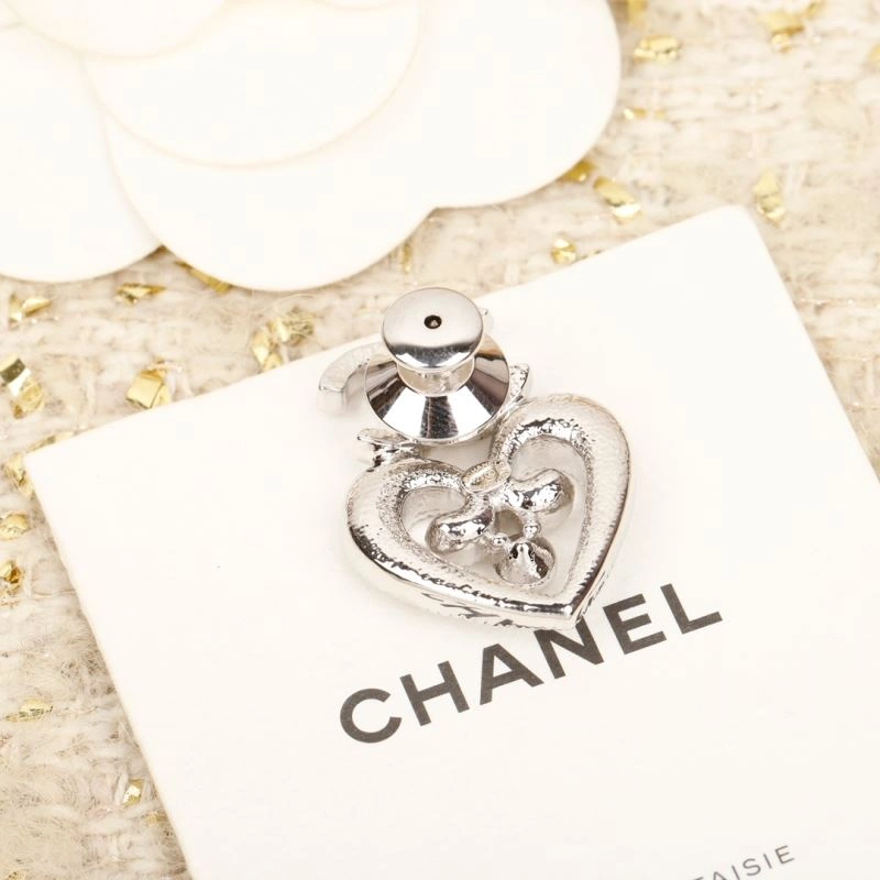 Cut-rate Chanel Brooches