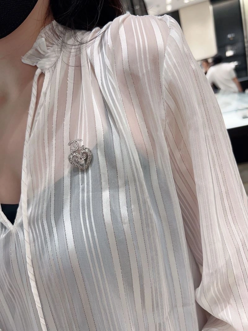 Cut-rate Chanel Brooches