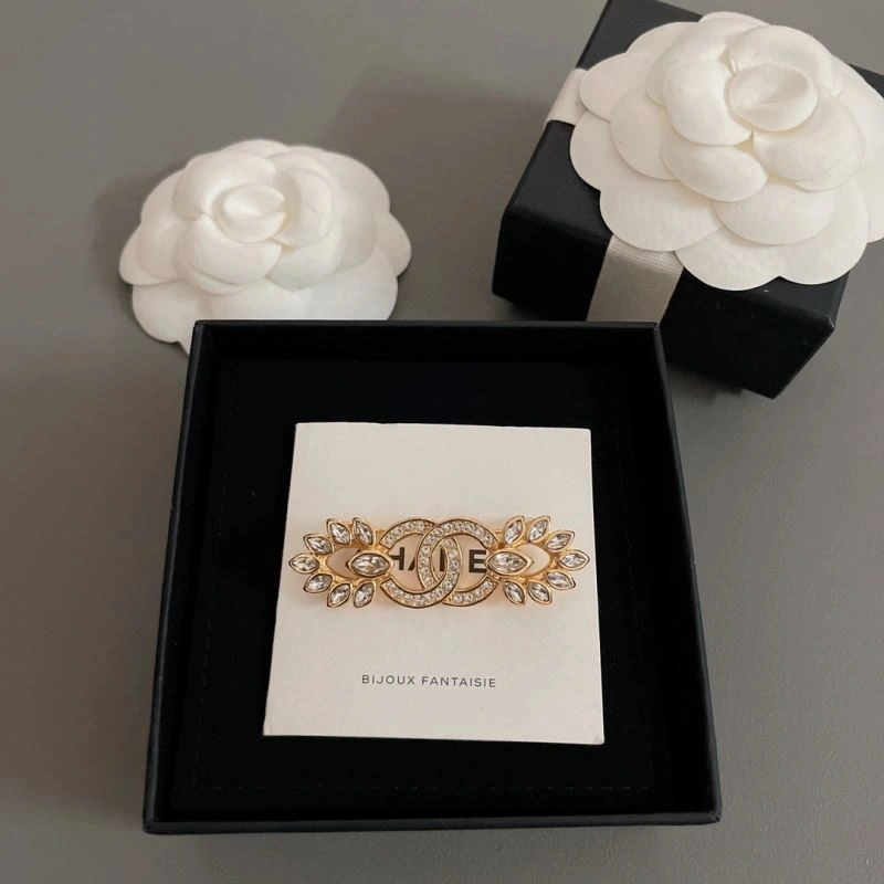 Indistinguishable Chanel Brooches