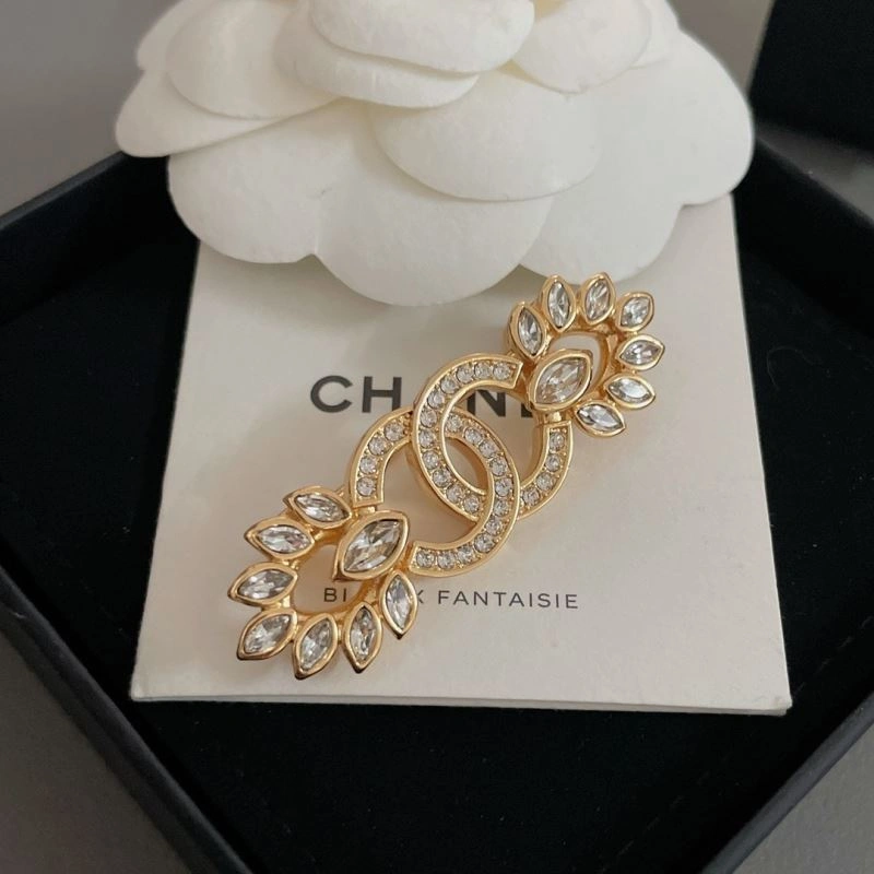 Indistinguishable Chanel Brooches