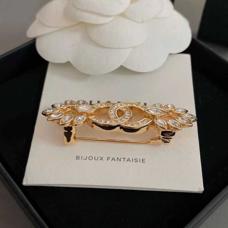 Indistinguishable Chanel Brooches