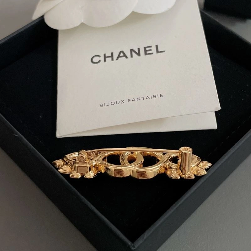 Indistinguishable Chanel Brooches