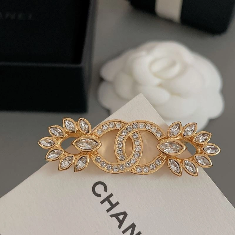 Indistinguishable Chanel Brooches