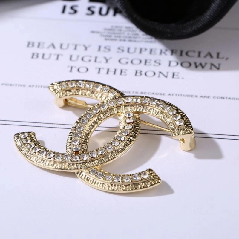 Reasonably priced Chanel Brooches