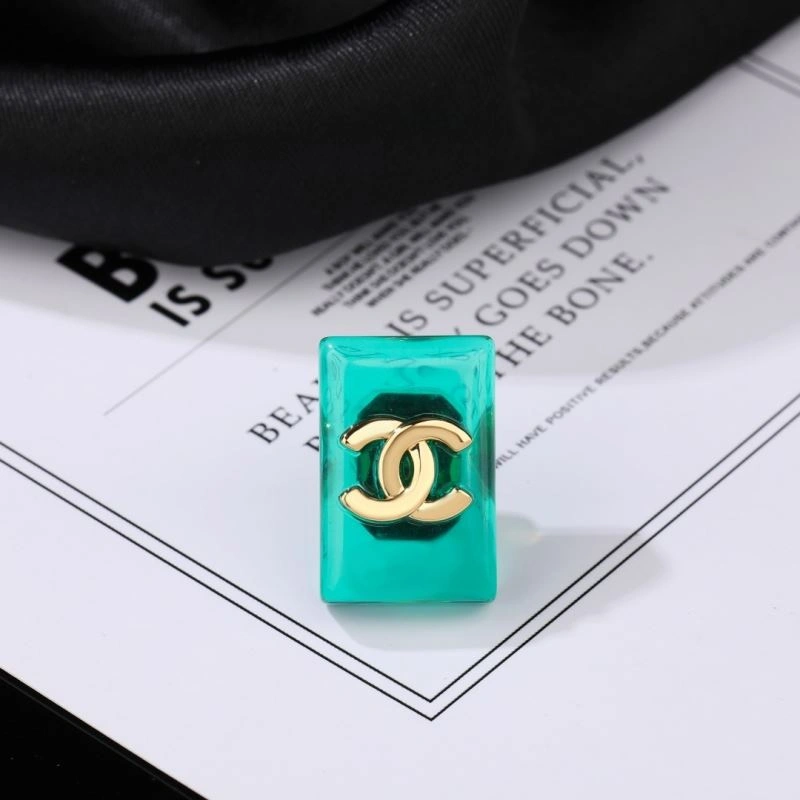 Indistinguishable Chanel Brooches