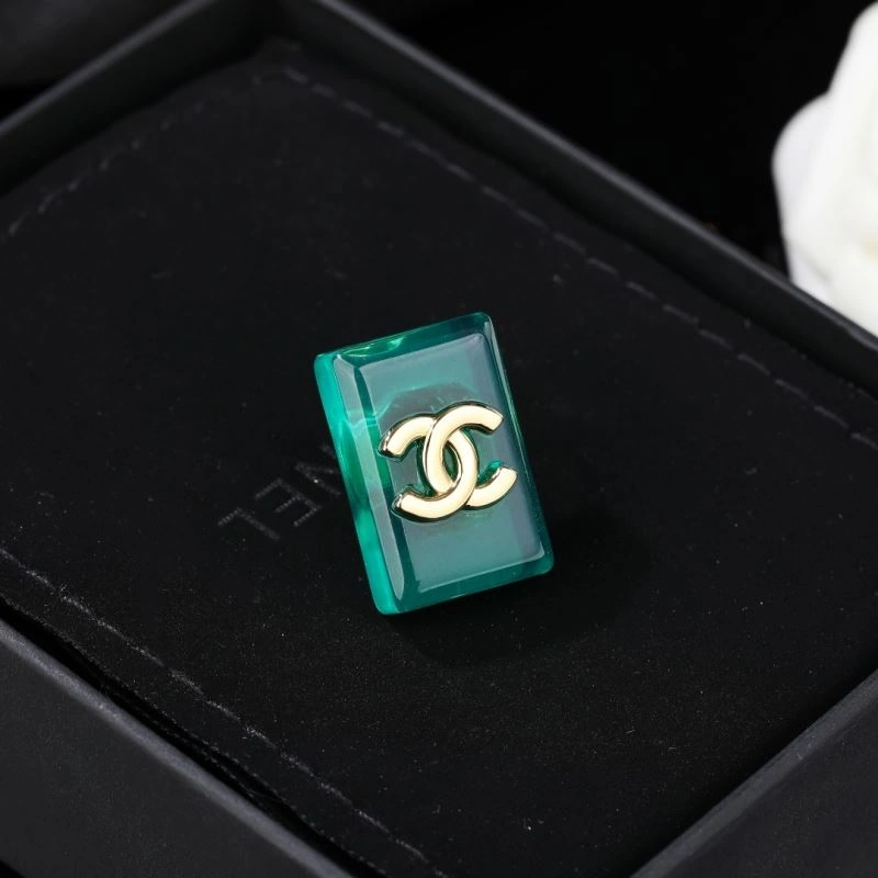 Indistinguishable Chanel Brooches