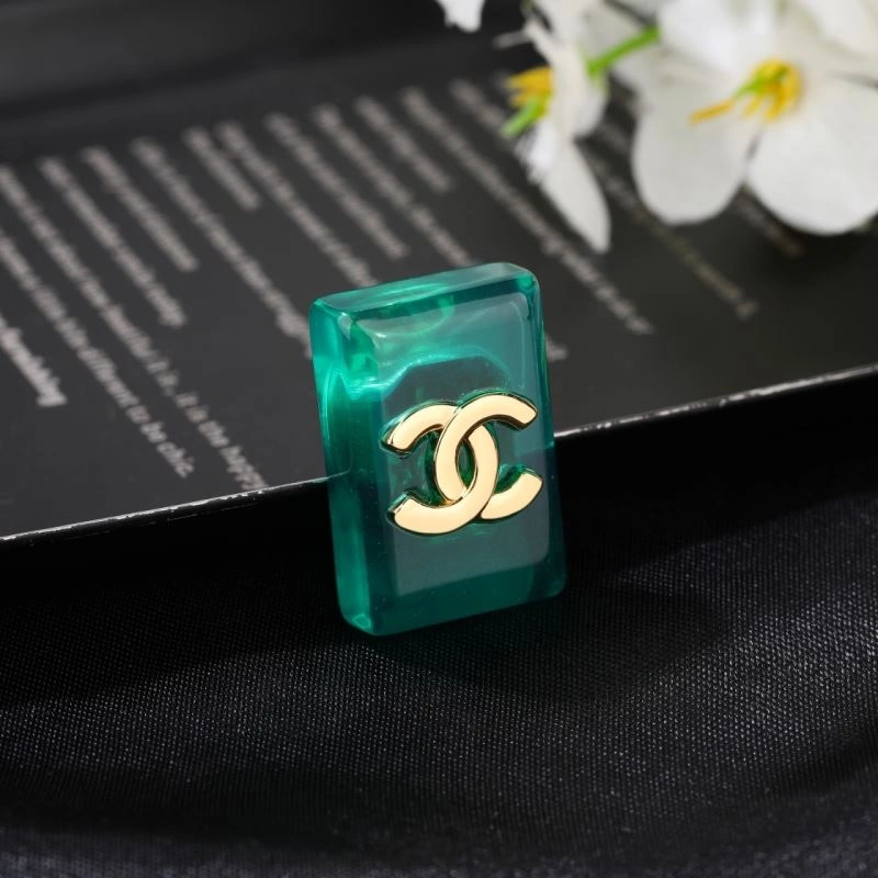 Indistinguishable Chanel Brooches