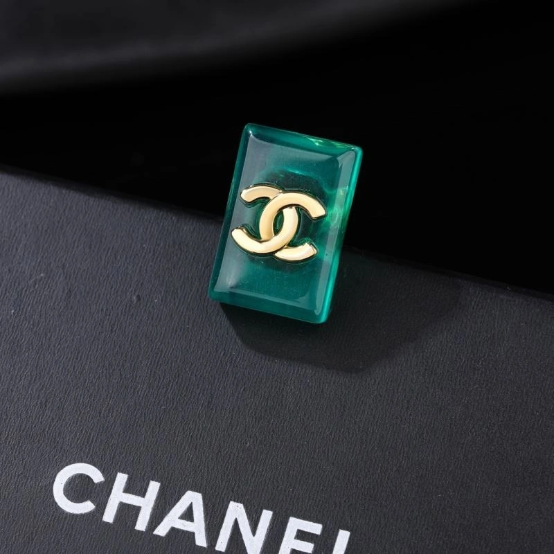 Indistinguishable Chanel Brooches