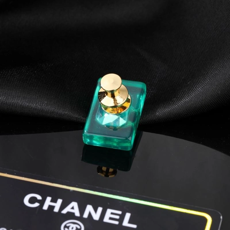 Indistinguishable Chanel Brooches