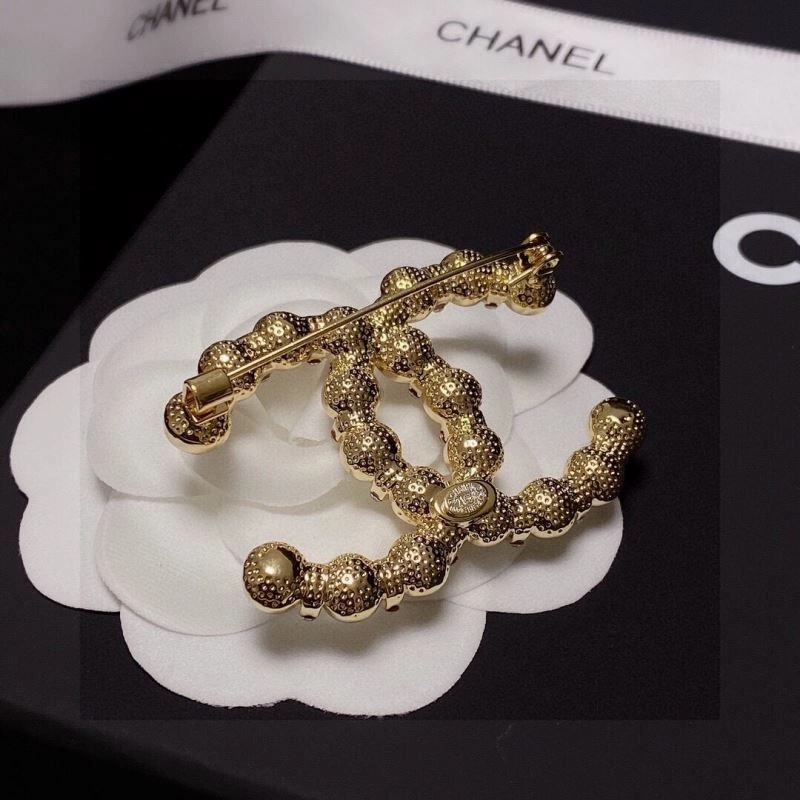 Reasonably priced Chanel Brooches