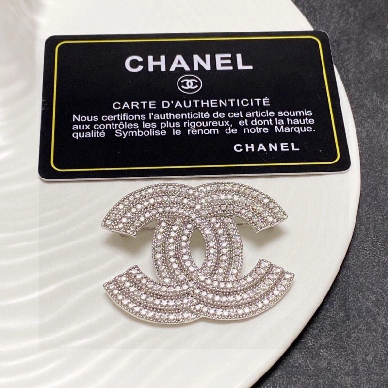 Indistinguishable Chanel Brooches