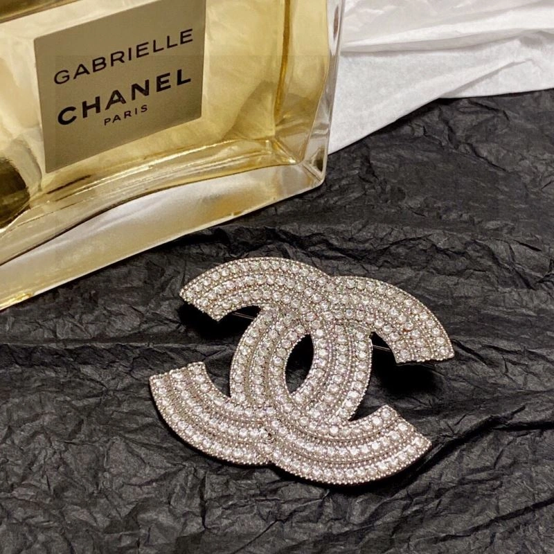 Indistinguishable Chanel Brooches