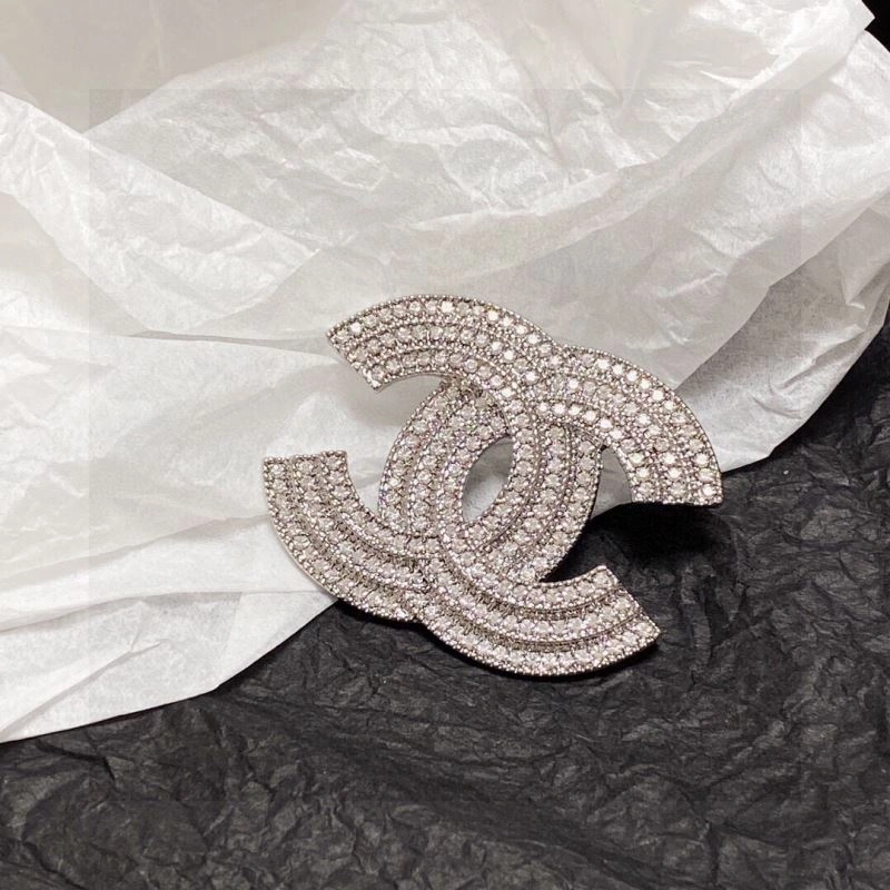 Indistinguishable Chanel Brooches