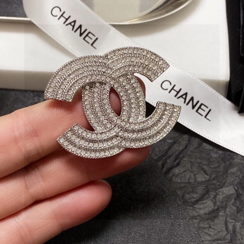 Indistinguishable Chanel Brooches