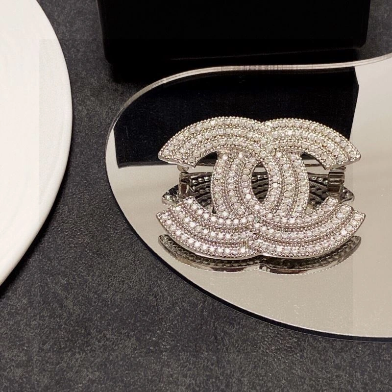 Indistinguishable Chanel Brooches