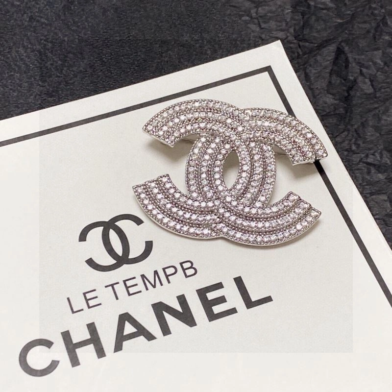Indistinguishable Chanel Brooches