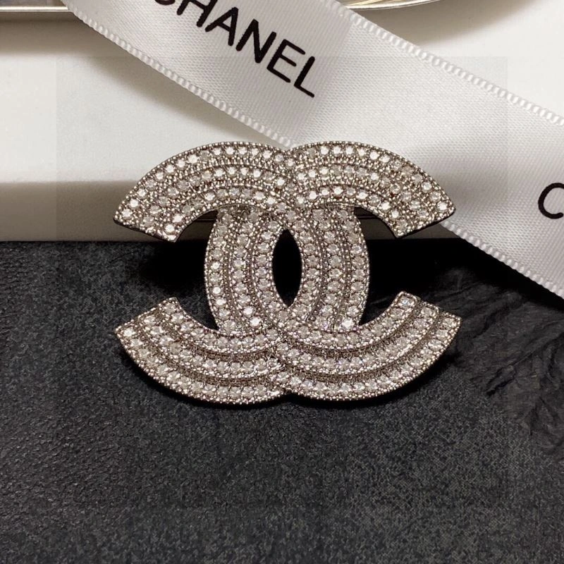 Indistinguishable Chanel Brooches