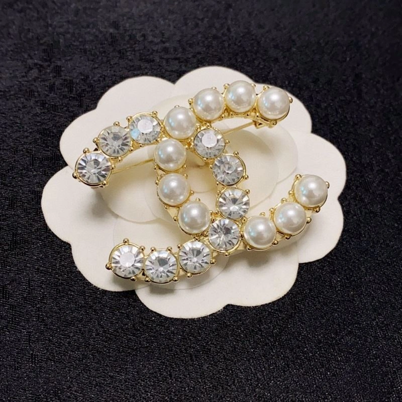 Reasonably priced Chanel Brooches