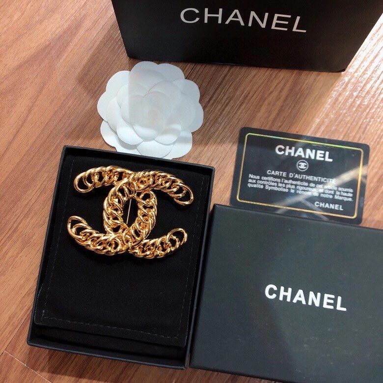 Reasonably priced Chanel Brooches