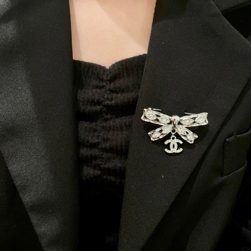 Indistinguishable Chanel Brooches