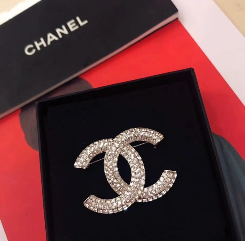 Indistinguishable Chanel Brooches