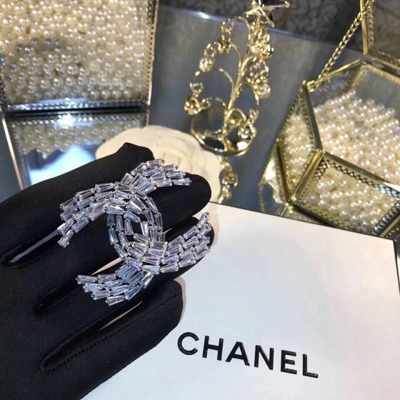 Cut-rate Chanel Brooches